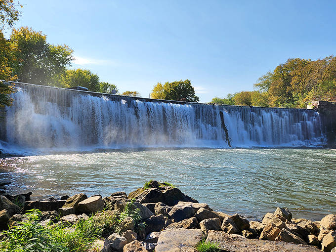 The Lanesboro Stone Dam creates nature's perfect soundtrack, a rushing waterfall that's been serenading visitors and locals alike for generations.