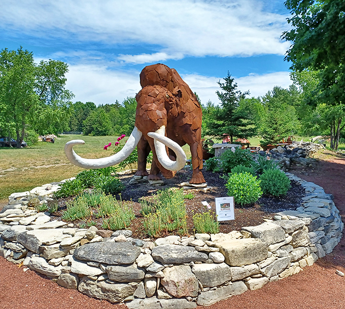 An impressive mammoth sculpture stands sentinel, its metal tusks gleaming in the sunlight &ndash; prehistoric meets contemporary.