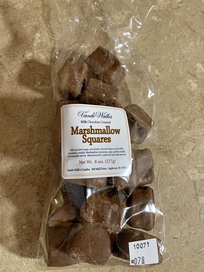 Marshmallow Squares that would make s'mores jealous &ndash; pillowy vanilla marshmallow enrobed in milk chocolate for a nostalgic treat with a gourmet twist.