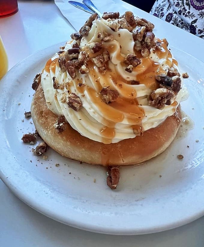 The Minneapple Bliss Hi-Top combines cinnamon apples, whipped cream, and candied pecans in what can only be described as edible architecture.