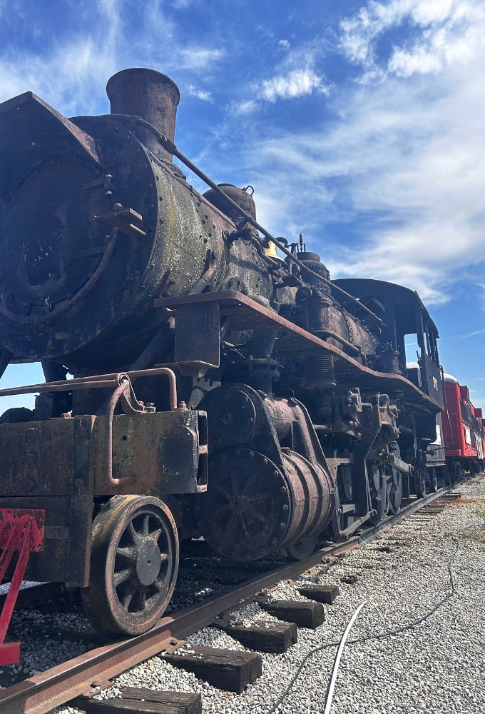Norfolk & Western locomotive No. 917 sits frozen in time, its weathered exterior telling stories of journeys long past.
