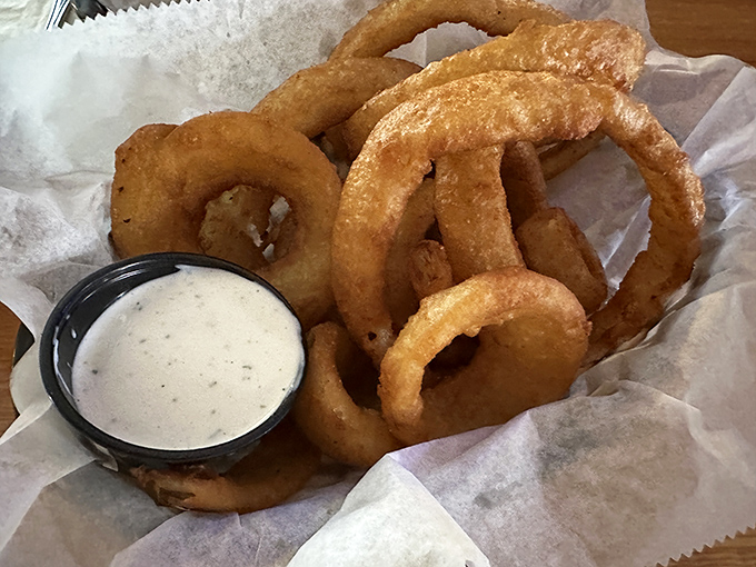 Crispy, golden onion rings that would make even Darth Vader remove his helmet for a bite.