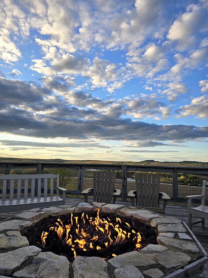 The communal fire pit becomes social central as evening falls, where safari stories flow as freely as the flames dance against the darkening sky.