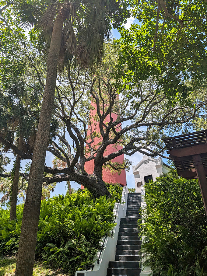 The winding staircase beckons visitors upward, each step a journey through maritime history toward that promised panoramic reward.