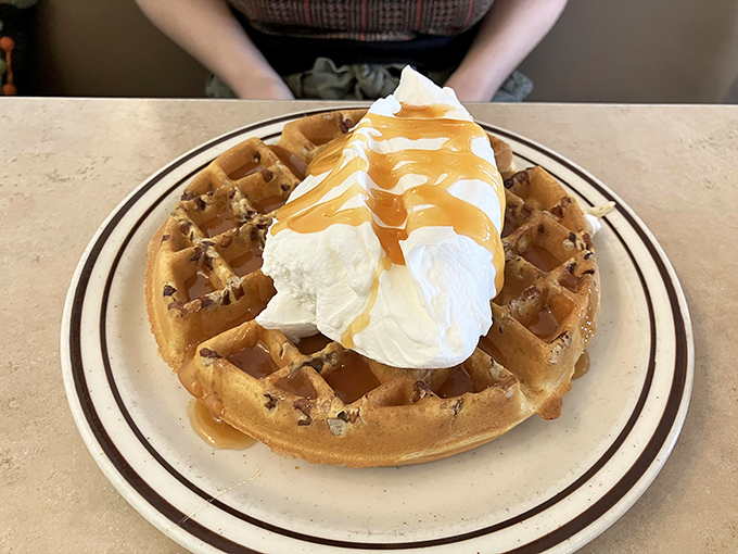 This Belgian waffle doesn't just have toppings &ndash; it has a whipped cream crown and caramel scepter fit for breakfast royalty.
