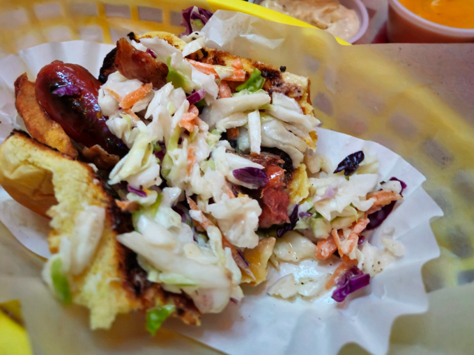 This isn't just coleslaw on a hot dog&mdash;it's a masterpiece of textures and flavors. Like a crunchy, creamy symphony in a bun.