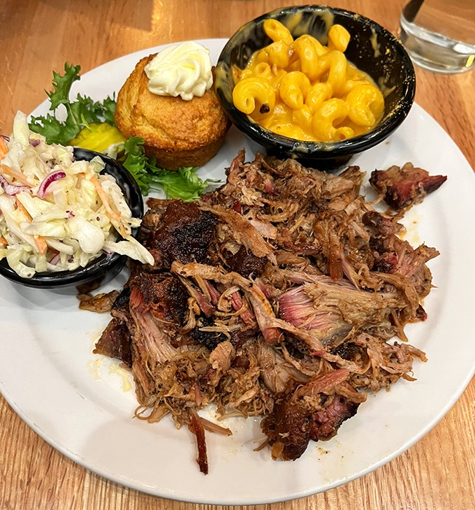 Pulled pork that surrenders to your fork with dignity &ndash; each strand a testament to hours of patient smoking and seasoning.