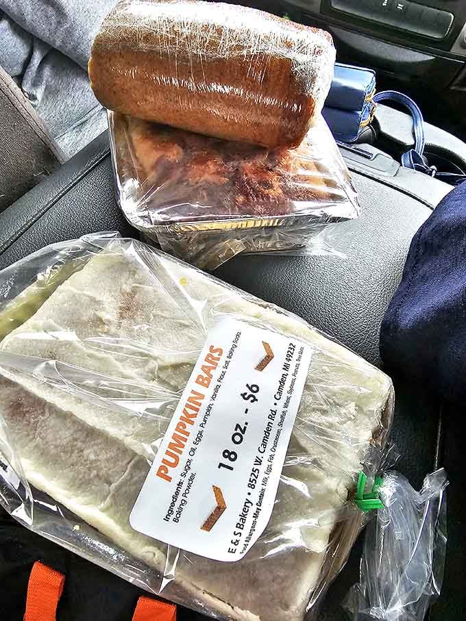 Pumpkin bars waiting patiently in their wrapper. The perfect marriage of spiced pumpkin and cream cheese that puts pumpkin spice lattes to shame.