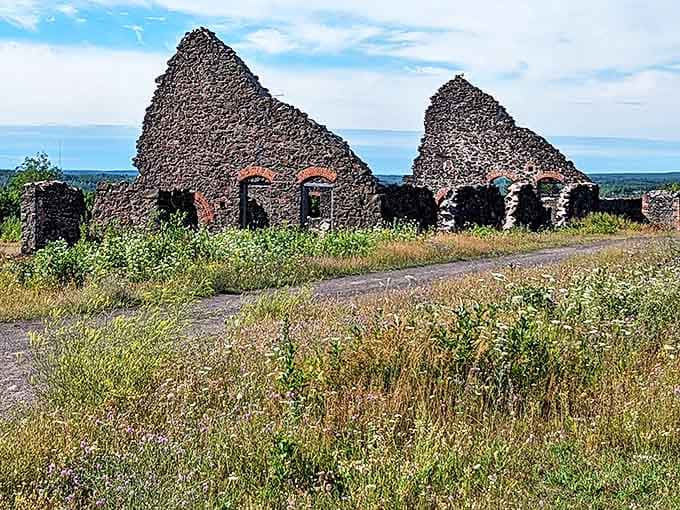 Quincy Mine Dryhouse Ruins: Stone walls whisper stories of copper boom days, standing defiantly against time while wildflowers reclaim their territory.