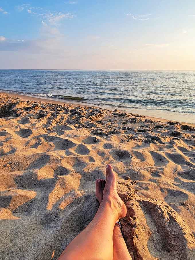 Nothing says "I've officially left my problems behind" like stretching out on warm sand with Lake Michigan's gentle waves as your soundtrack.