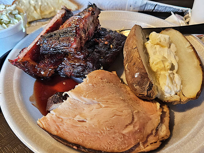 A plate that tells a story of perfect timing &ndash; ribs with bark that shatters just right, turkey that defies poultry physics by staying impossibly juicy.