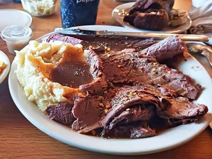 Tender slices of roast beef arranged like edible art, proving that sometimes the simplest presentations are the most mouthwatering&mdash;no fancy plating required here, folks.