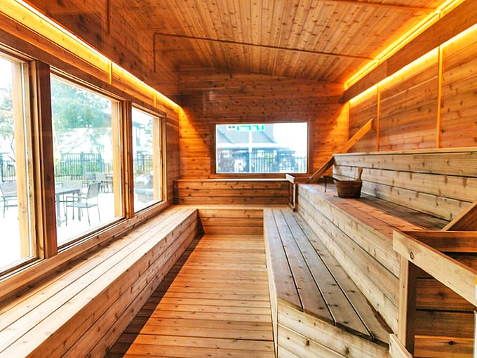 Finnish-inspired wooden sanctuary where stress evaporates faster than the water on those hot rocks &ndash; Minnesota therapy at its finest.