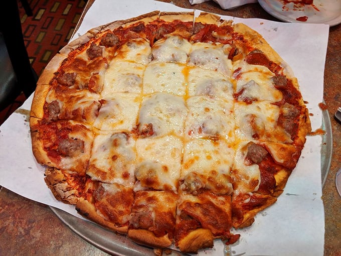 The sausage and cheese pizza doesn't just satisfy hunger &ndash; it creates memories with every savory, gooey bite.