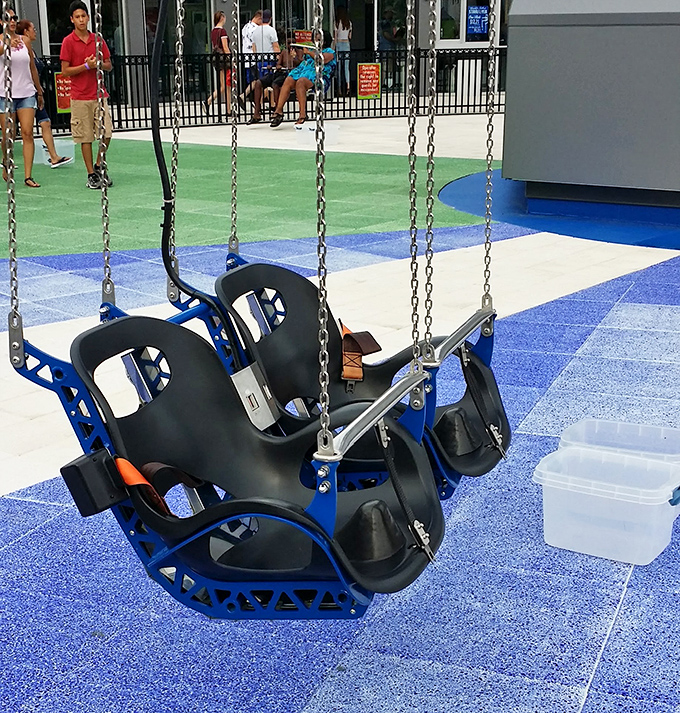 These innocent-looking seats are your chariots to the sky – deceptively normal until they're dangling 45 stories up.