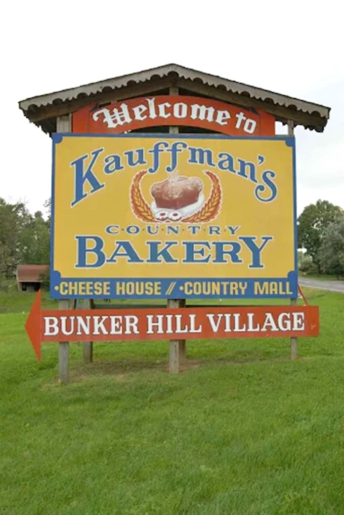 The roadside sign promises three essential food groups: bakery, cheese house, and country mall &ndash; the holy trinity of Amish country delights.
