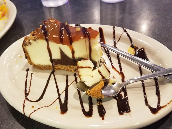 A slice of creamy heaven drizzled with cosmic swirls of chocolate and caramel &ndash; worth saving room for, even after a close encounter with BBQ.