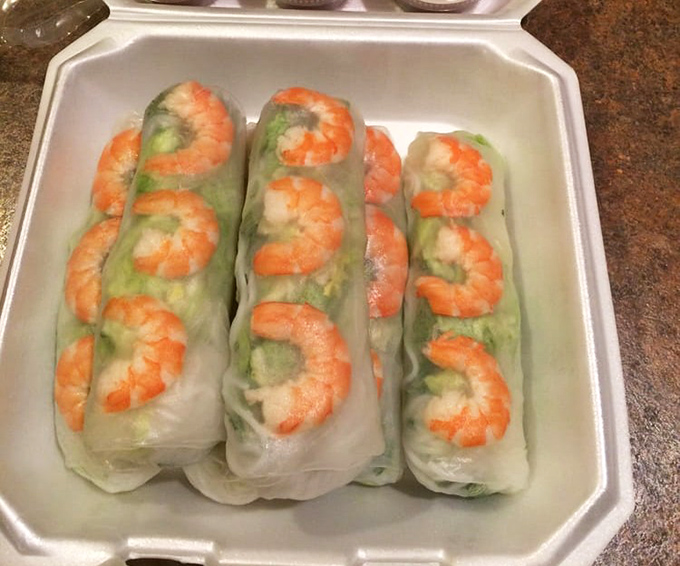 These spring rolls are edible art &ndash; translucent rice paper showcasing plump shrimp and fresh herbs like nature's stained glass windows.