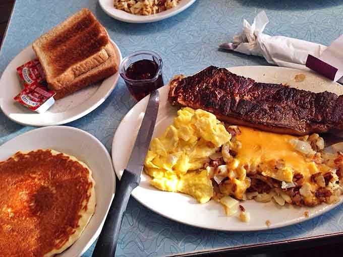 The breakfast of champions: eggs, hash browns, and a steak that makes you question why anyone would ever skip the most important meal.