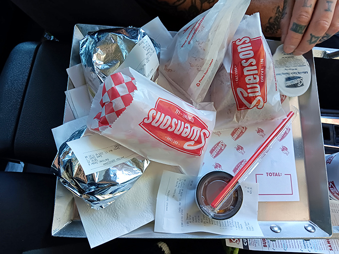 Tray: Car dining at its finest &ndash; a perfectly arranged feast delivered right to your window by sprinting carhops. No apps, just appetites!