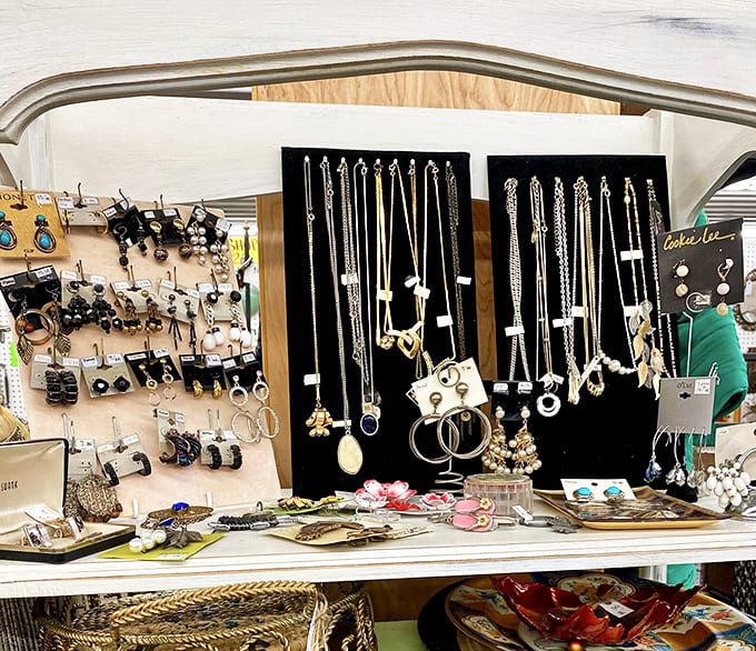 Vintage jewelry displays sparkle with history &ndash; each necklace and earring set once adorned someone's special occasion before waiting here for its next chapter.