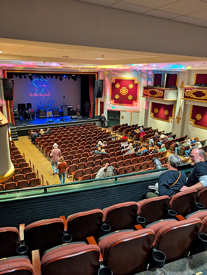 Anticipation builds as theater-goers find their seats, ready to share in the collective experience that only live performance can deliver.