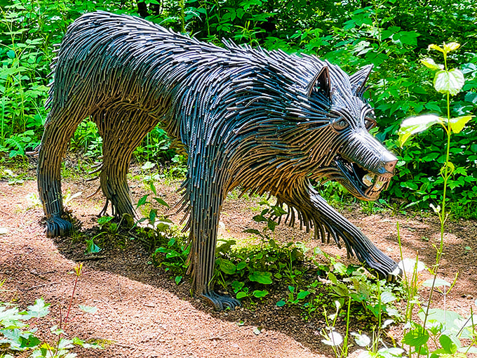 This metallic wolf prowls the forest floor, assembled from recycled parts yet somehow capturing the wild spirit of its living counterparts.
