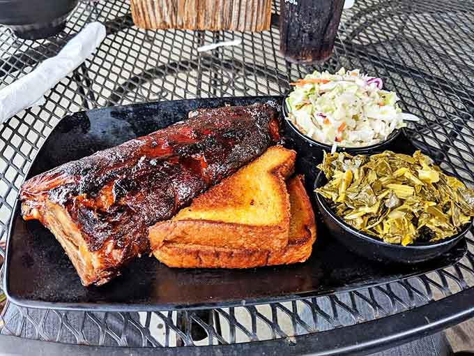 Fall-off-the-bone ribs share plate space with perfectly executed sides &ndash; a balanced meal if balance means "multiple forms of deliciousness."