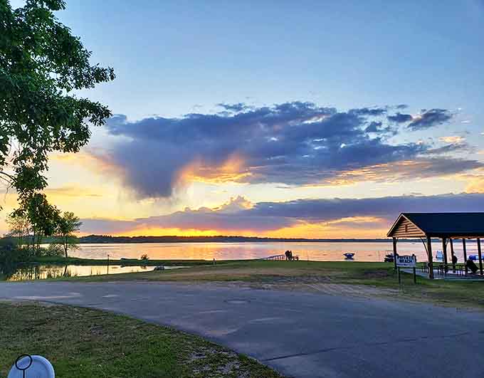 When Minnesota sunsets perform, everyone stops to watch &ndash; nature's own light show reflecting perfectly on Leech Lake's calm evening waters.