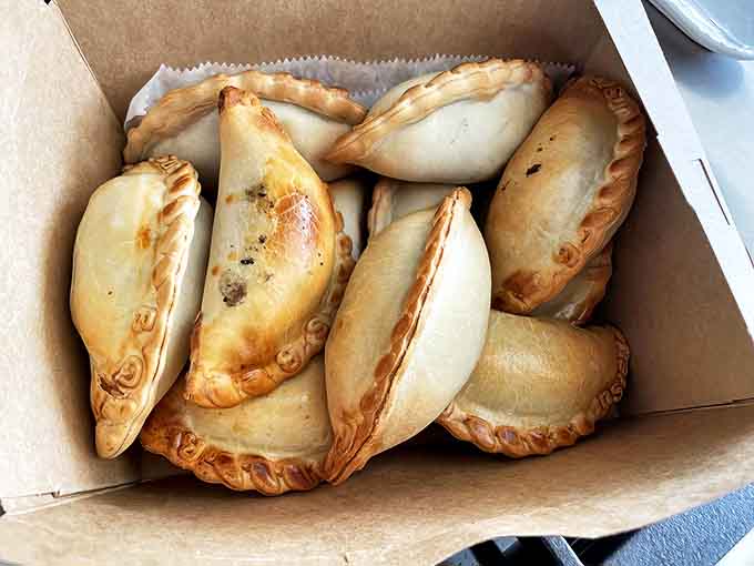 Empanada heaven in a box! These golden-brown beauties are perfectly portable, making them ideal for picnics, office lunches, or midnight snacks.