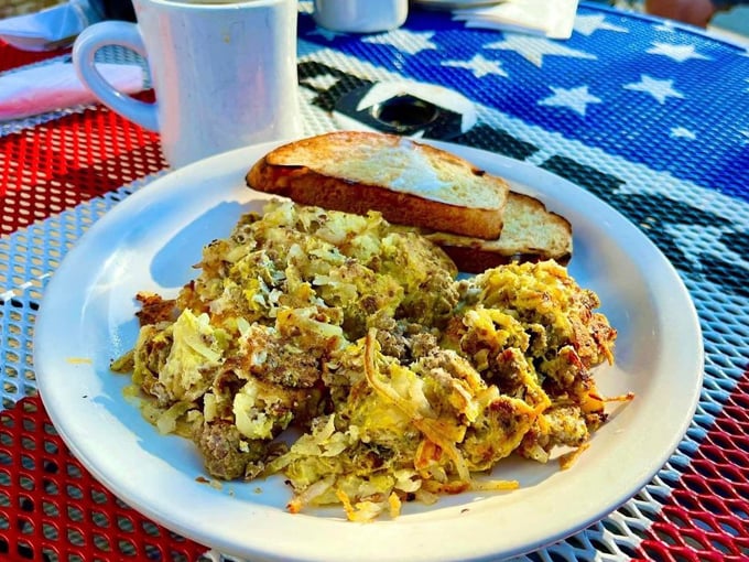 This isn't just breakfast, it's edible architecture &ndash; a masterpiece of eggs, meat, and potatoes that puts ordinary scrambles to shame.