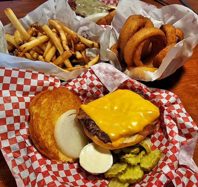 A perfect cheeseburger with golden fries &ndash; sometimes the simplest pleasures are the most profound. No filter needed for this beauty.
