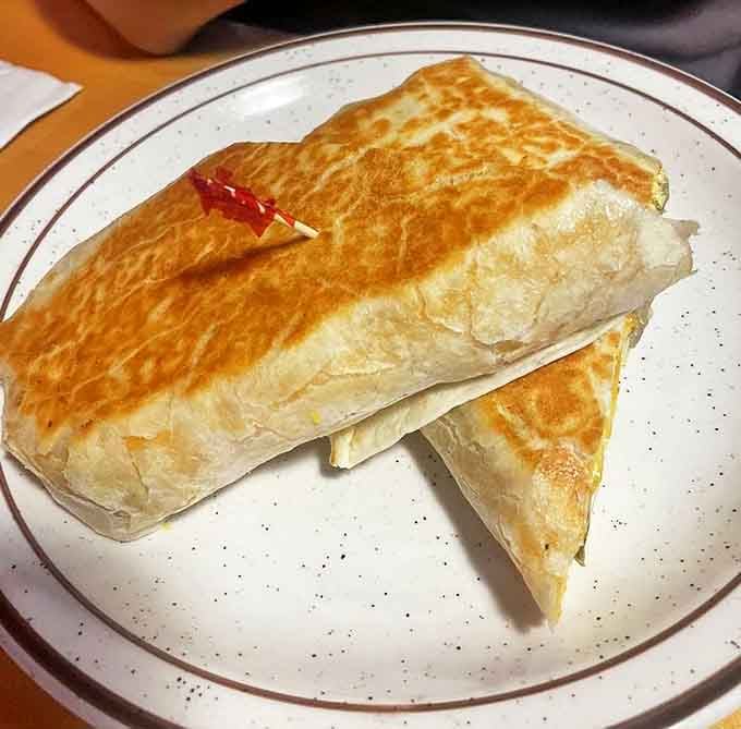 This breakfast burrito is cleared for takeoff, wrapped tight and ready to deliver a payload of morning deliciousness straight to your taste buds.