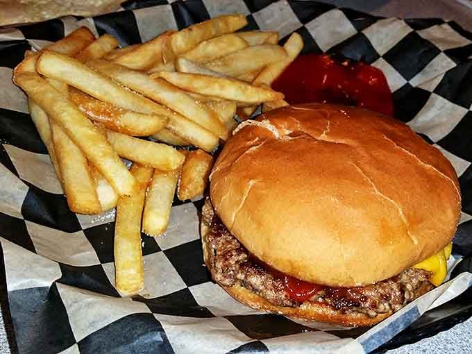 Simple perfection on a plate &ndash; a hand-formed patty, melted cheese, and a soft bun served with fries that actually taste like potatoes.