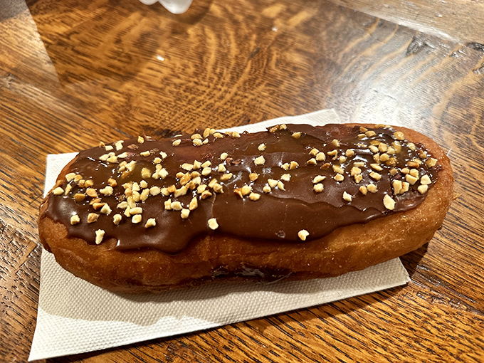 The chocolate &eacute;clair &ndash; where decadence meets craftsmanship. That chocolate topping has the perfect snap that makes your teeth tingle with anticipation.