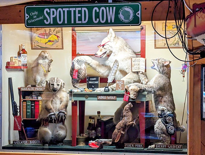 "The Trial" diorama features a stern wolf judge presiding over a woodland courtroom where a guilty-looking badger awaits his fate.