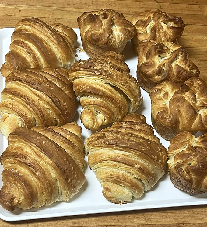 Golden-brown croissants with their perfectly laminated layers promise a buttery explosion with every bite. Flaky heaven awaits!