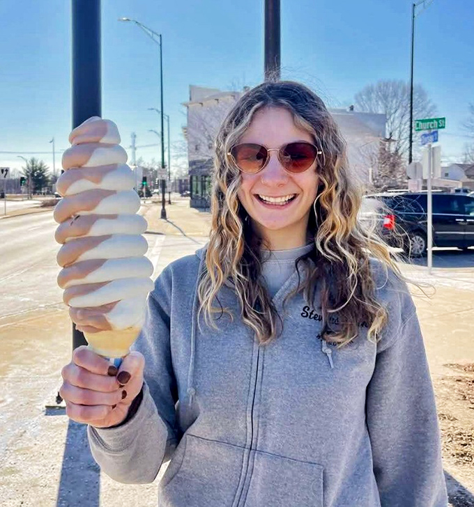 The joy on this customer's face says it all &ndash; conquering Belt's famous cone is equal parts challenge and triumph.