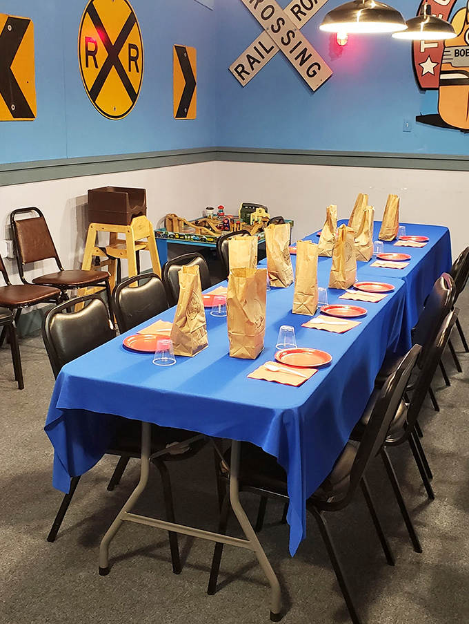 A dining table that could tell stories, positioned perfectly for those "pass the potatoes and look at that sunset" moments.