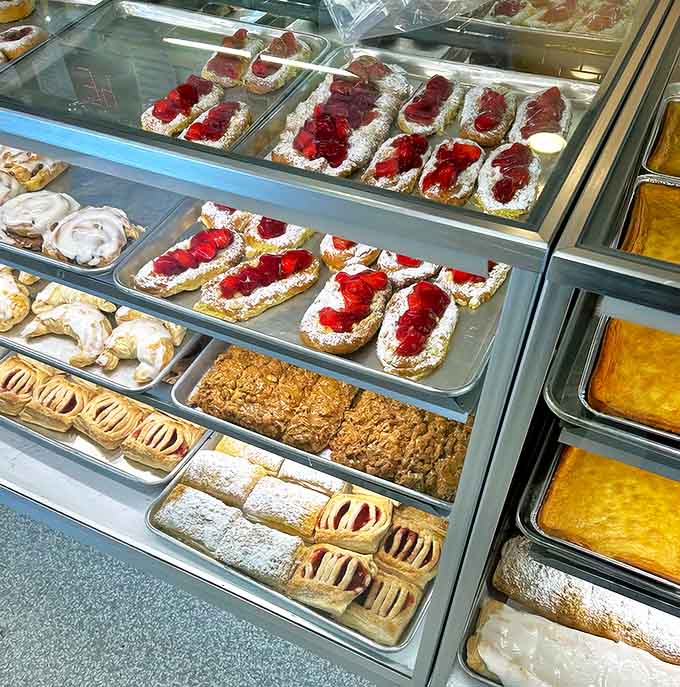 Ruby-red strawberries nestle in beds of cream atop flaky pastry &ndash; so beautiful you almost don't want to eat them. Almost.