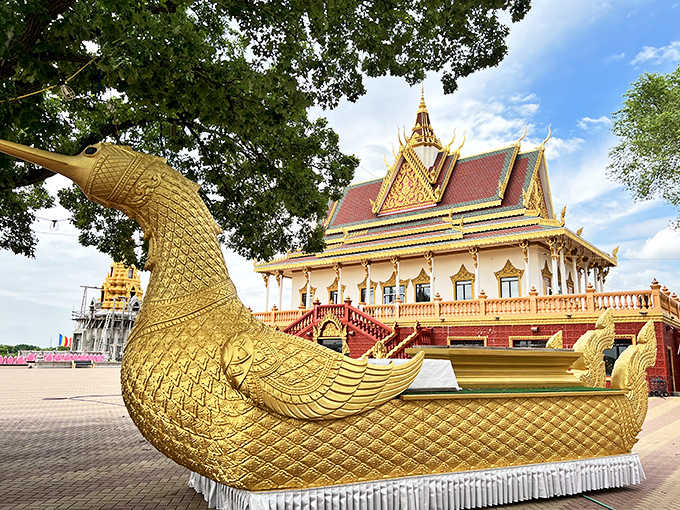 This magnificent golden bird vessel isn't just decorative—it's a symbol of transcendence in Buddhist tradition, gloriously out of place yet perfectly at home.