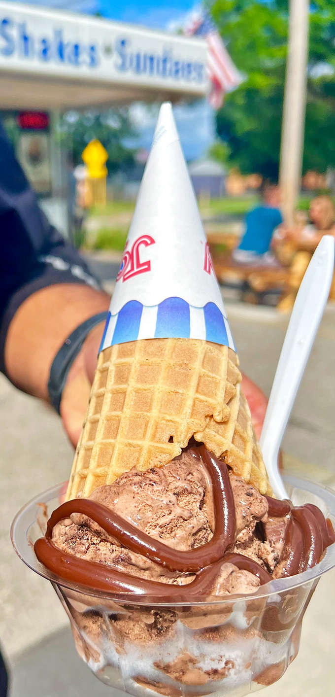 Some people see a cone with chocolate ice cream and hot fudge. Locals see a rite of passage in edible form.