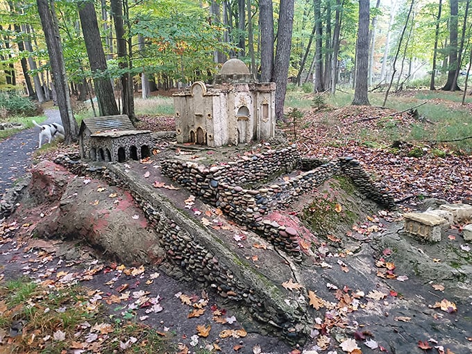 A miniature concrete castle rises from the forest floor &ndash; part fairytale, part folk art, entirely enchanting in its detailed craftsmanship.