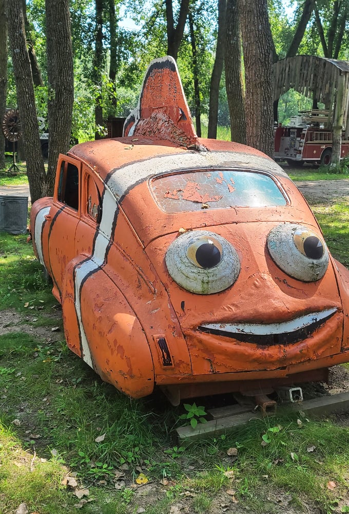 This grinning orange car looks like it swam right out of an animated movie &ndash; Nemo on wheels with the happiest headlights in Minnesota.