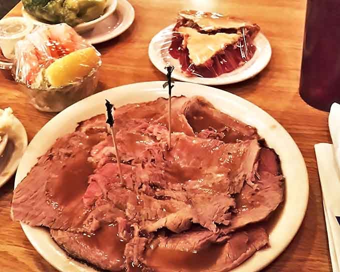 Prime rib so tender it practically surrenders to your fork, served with the reverence this king of beef cuts deserves.