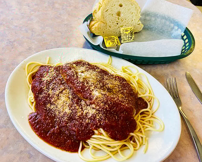 Spaghetti with marinara sauce and a generous dusting of Parmesan &ndash; comfort food elevated to an art form.