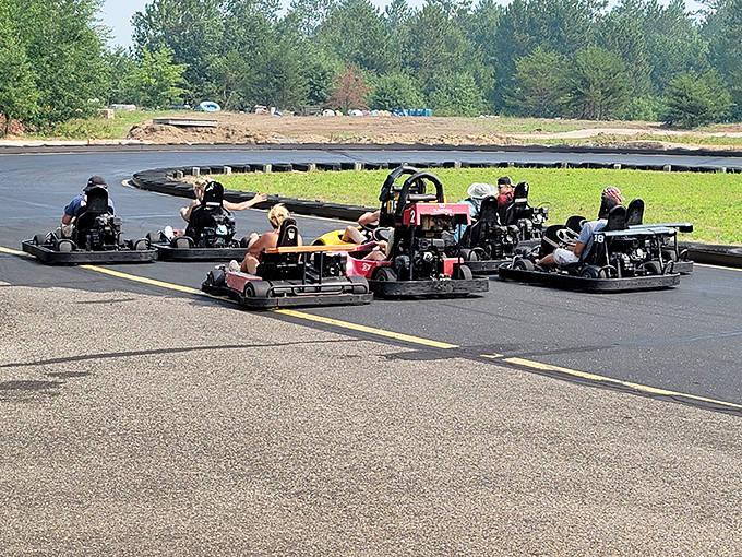 The starting grid fills with anticipation as drivers prepare for their moment of glory on Northland's well-maintained track.