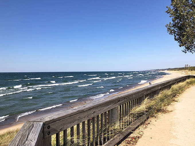 The beach curves along the shoreline like a smile, inviting you to kick off your shoes and remember what it feels like to be completely relaxed.