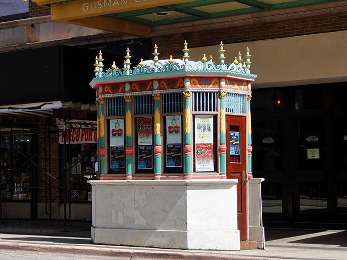 The whimsical ticket booth outside the Olympia Theater looks like it belongs in a fairy tale rather than downtown Miami.
