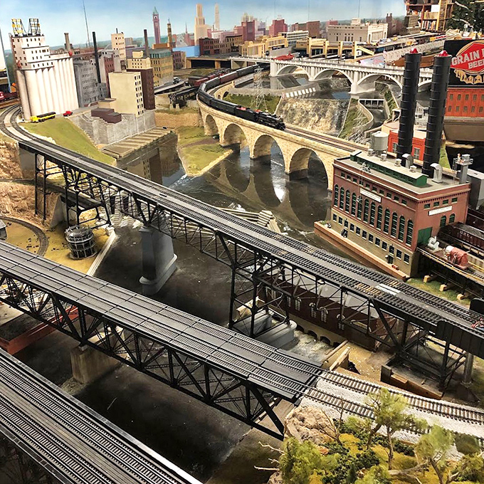 The museum's recreation of Minneapolis' iconic bridges spans miniature waters with engineering precision that would impress full-size architects.
